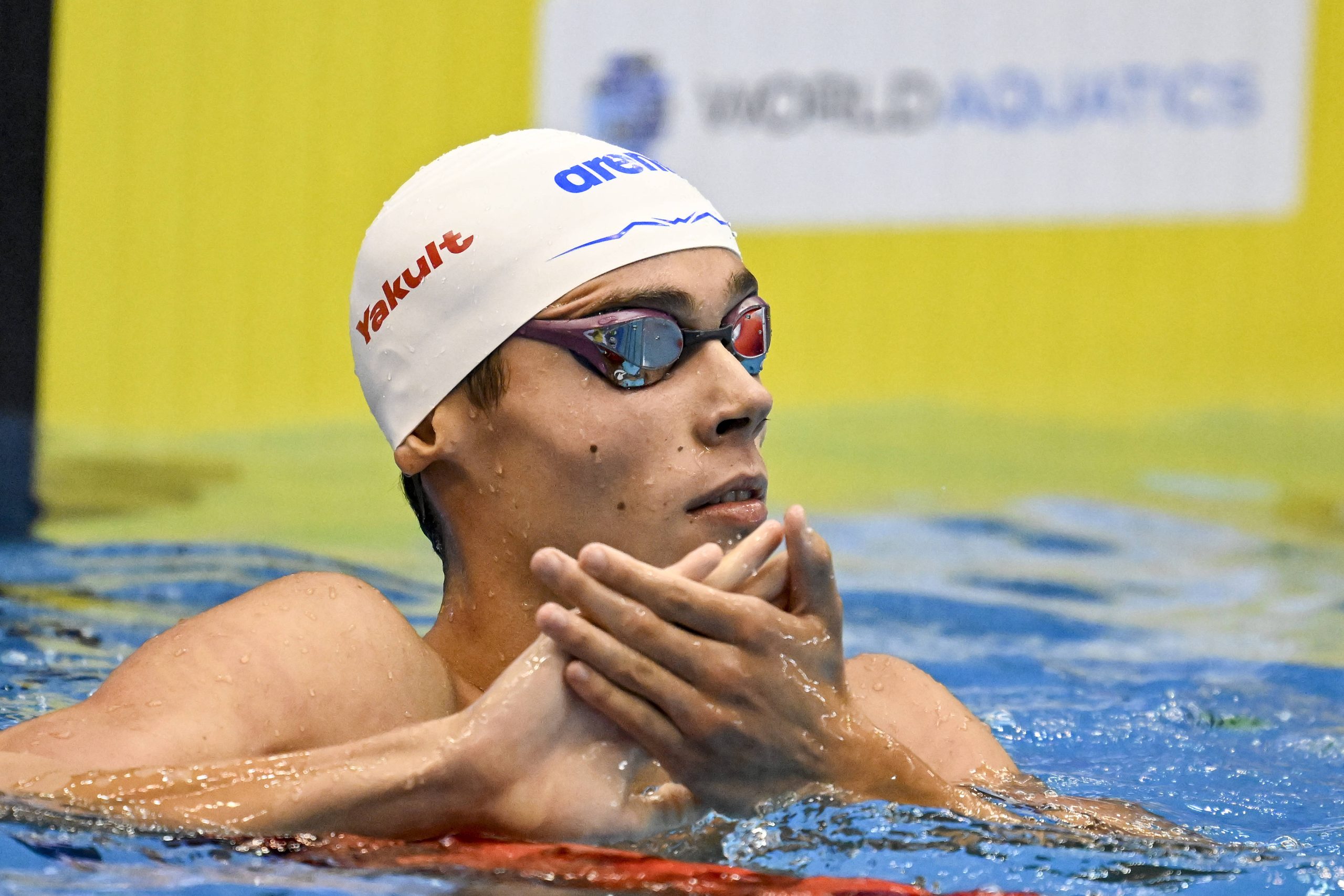 David Popovici în finala probei de 100 m liber, cu al doilea timp al semifinalelor . Surpriză ...