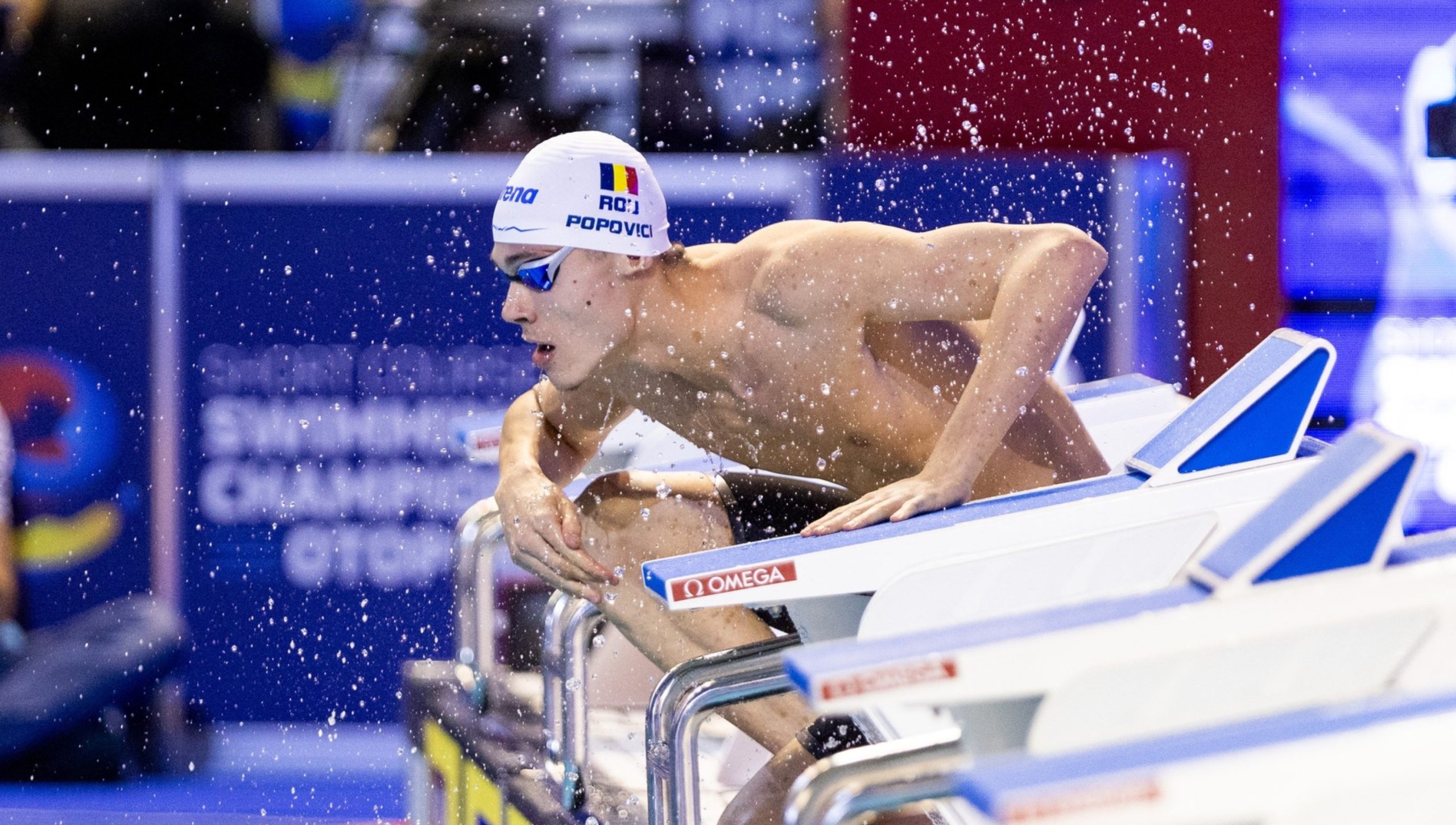 Motivul incredibil pentru care David Popovici a ajuns să umble cu laptele românesc după el în ...